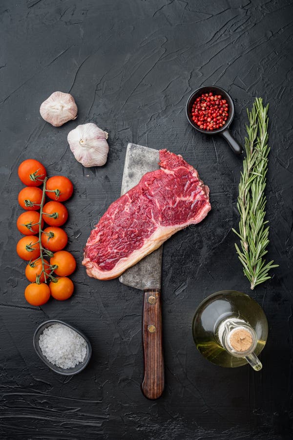 New York Steak, Raw Beef Meat , on Black Background, Top View Stock ...
