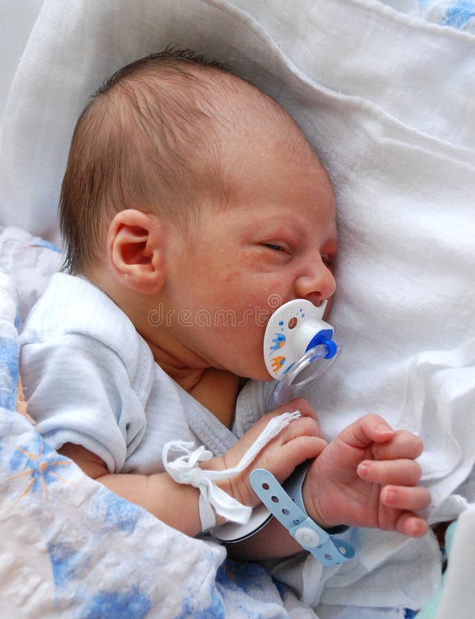 Newborn Baby with Pacifier Sleeping Stock Photo - Image of candid ...