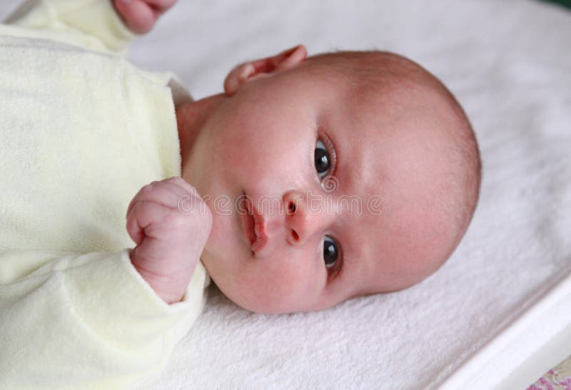 Squint of newborn baby stock image. Image of birthday - 36100187