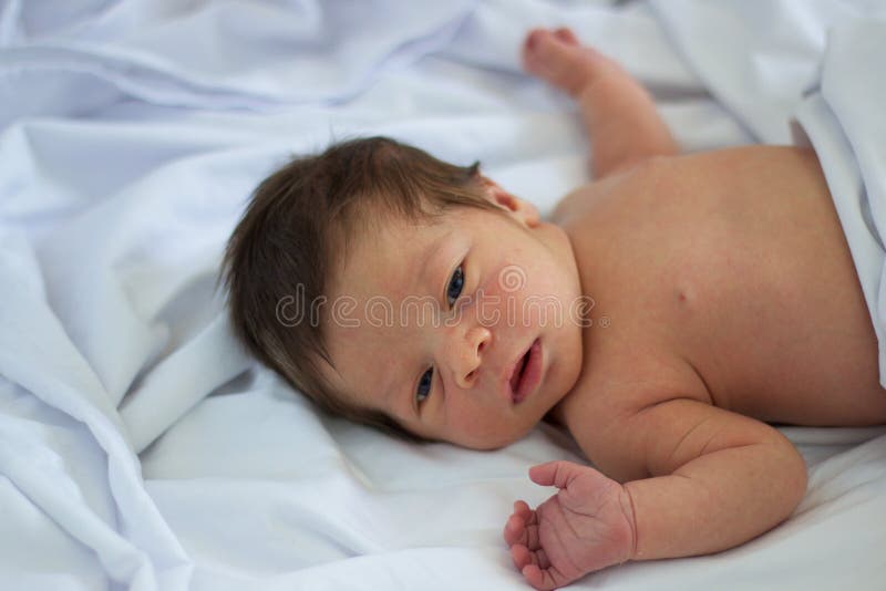 Newborn Baby on Back stock image. Image of loving, arms - 55207607