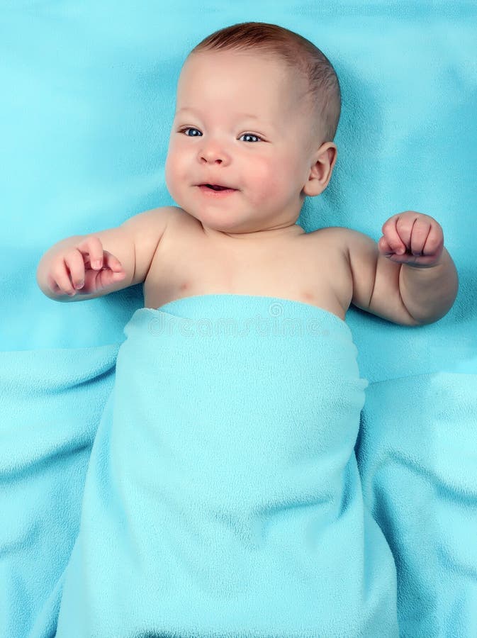 Newborn baby on blue stock image. Image of happy, innocent - 80781685
