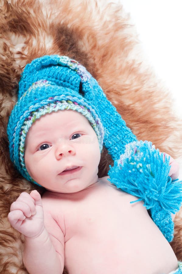 Newborn Baby on Blue Knitted Cap Stock Image - Image of infant, face ...