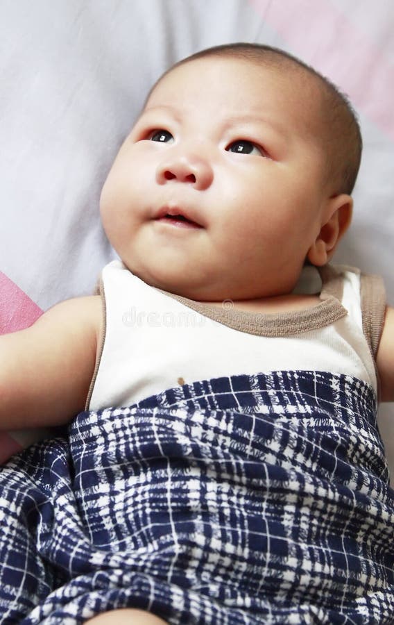 Newborn baby smirking stock image. Image of basket, shirtless - 12241227