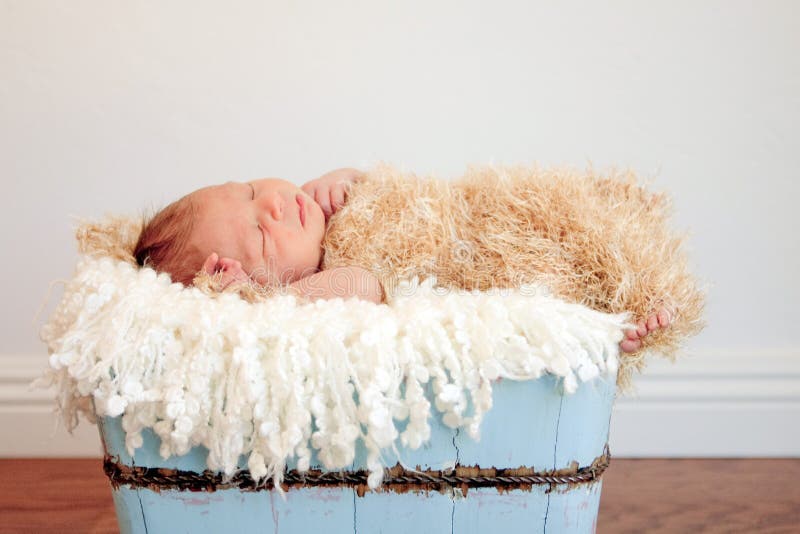 Newborn Baby Boy in Light Blue Wood Container Stock Image - Image of ...