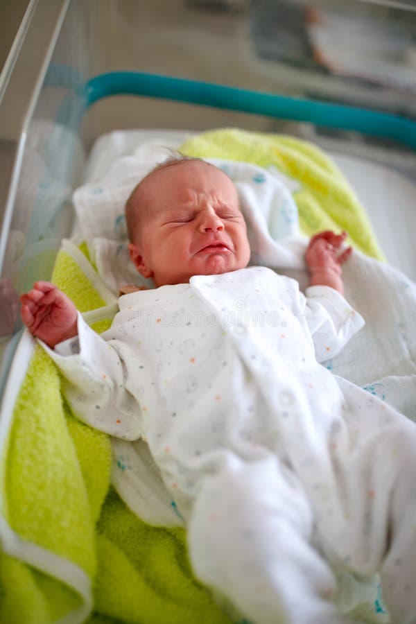 Newborn baby boy crying stock photo. Image of despair - 128650498