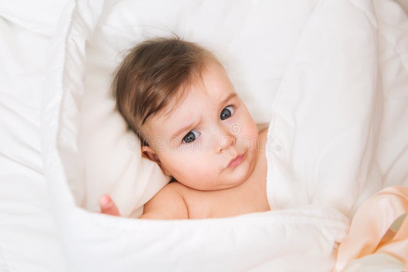 Newborn baby frowns stock photo. Image of infant, beautiful - 63753192