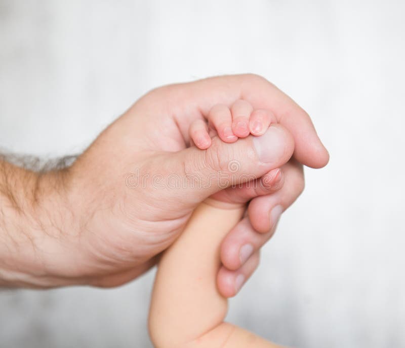Newborn Baby Hand in Father`s Hand Stock Photo - Image of catch, girl ...