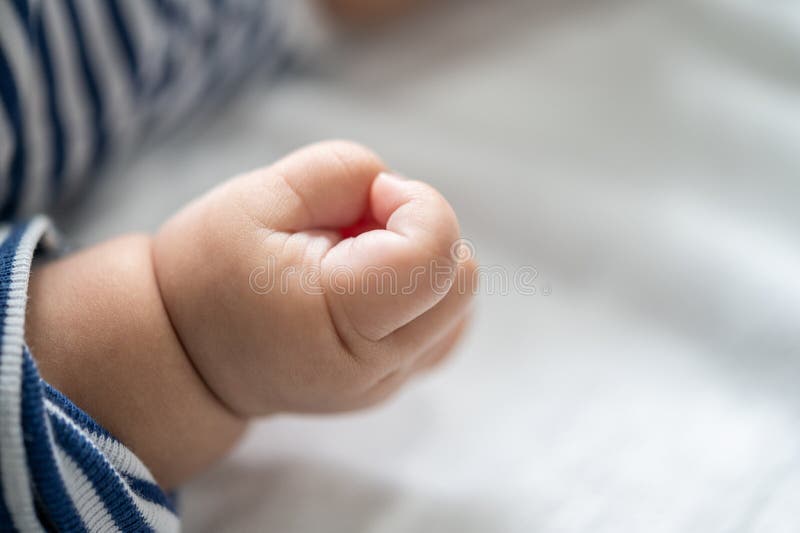 Newborn Baby Hand in White Bed Stock Image - Image of care, baby: 219163089
