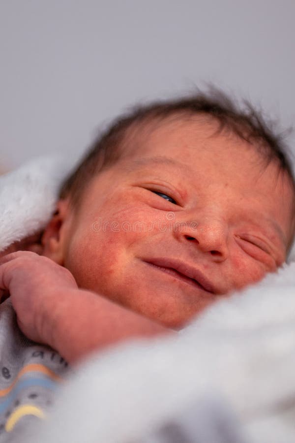Newborn Baby in Its First Hours of Life. Stock Photo - Image of medical ...