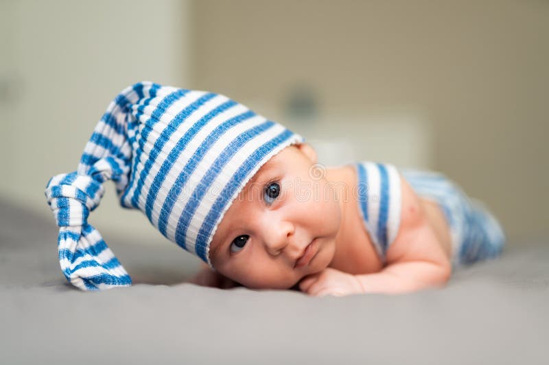 Newborn Baby with Knitted Cap. Baby Portrait Stock Photo - Image of ...