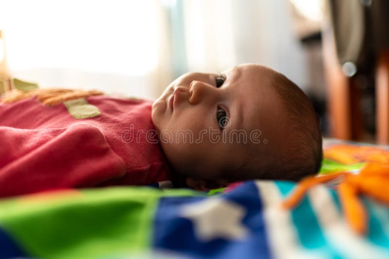 Newborn Baby Resting Relaxed Face Up on a Carpet Stock Image - Image of ...