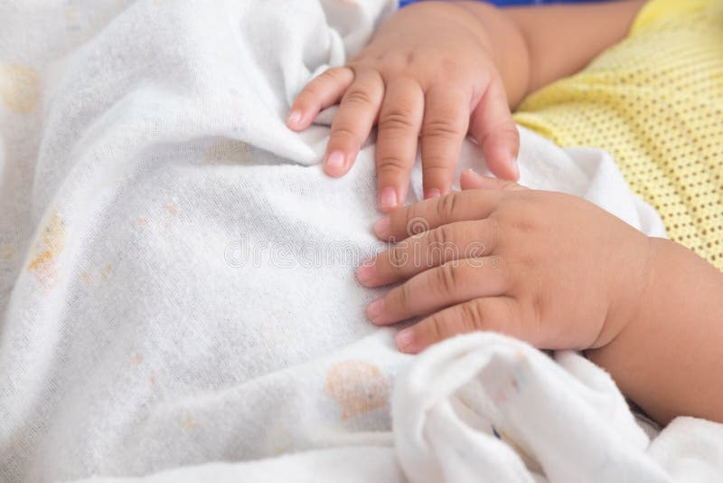 Newborn baby s hand stock image. Image of bright, cloth - 73831763