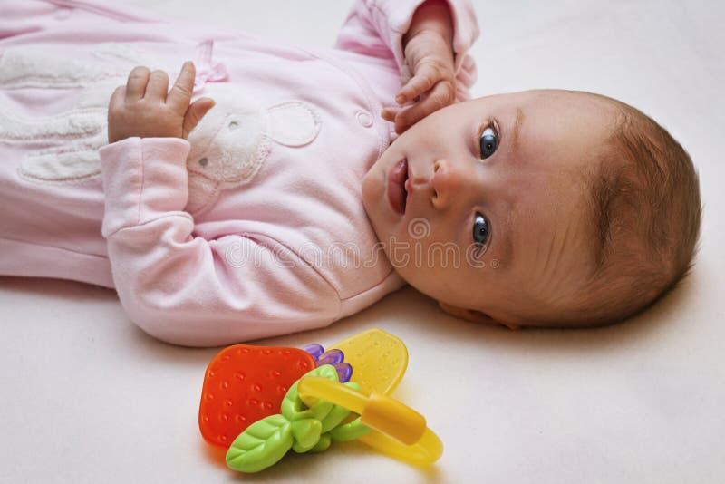Newborn baby and teether stock photo. Image of parenting - 20245012