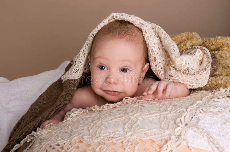 Newborn Baby Wrapped Light Brown Soft Fluffy Cloth Stock Photos - Free ...