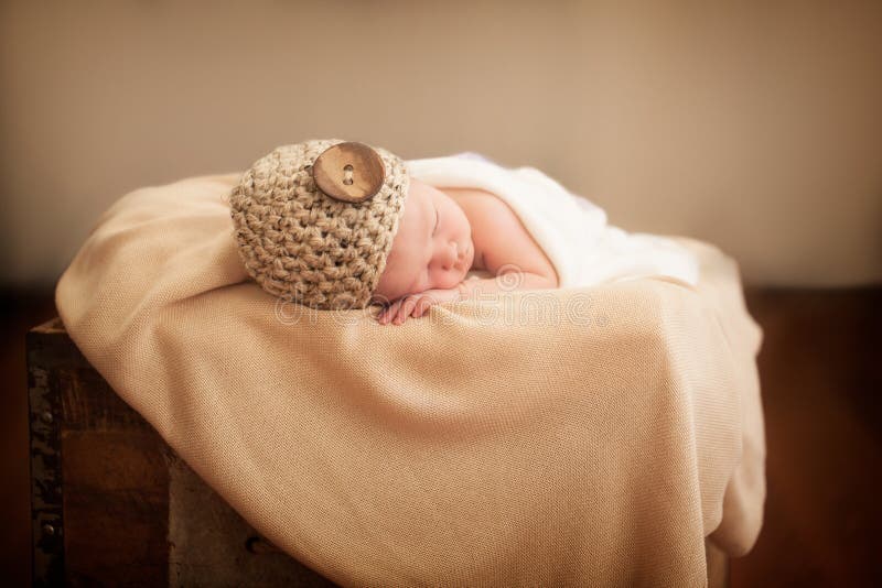 Newborn in a box stock image. Image of looking, beany - 32178953