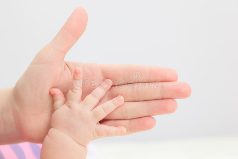 Newborn Hand Hold by Parent Stock Image - Image of human, fondness ...