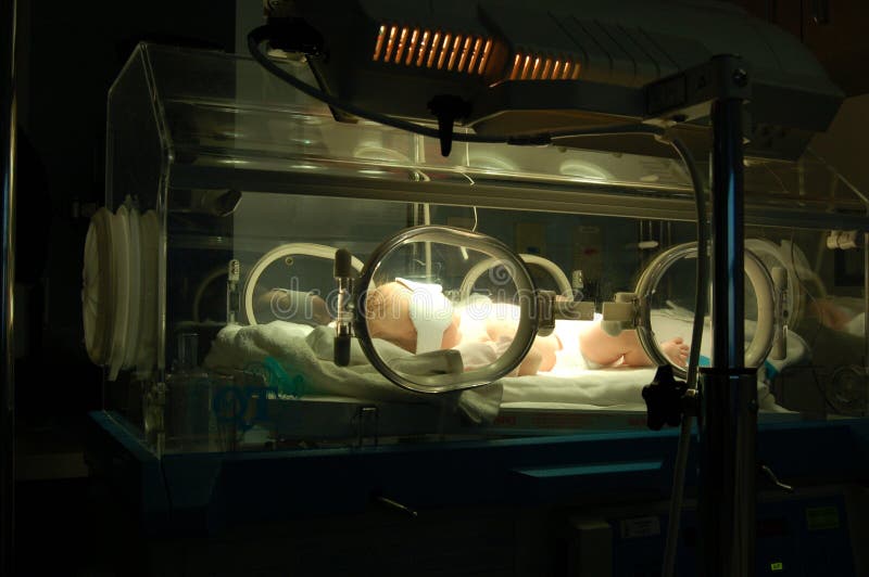 Newborn in Isolette 3 stock image. Image of tiny, bilirubin - 1587319