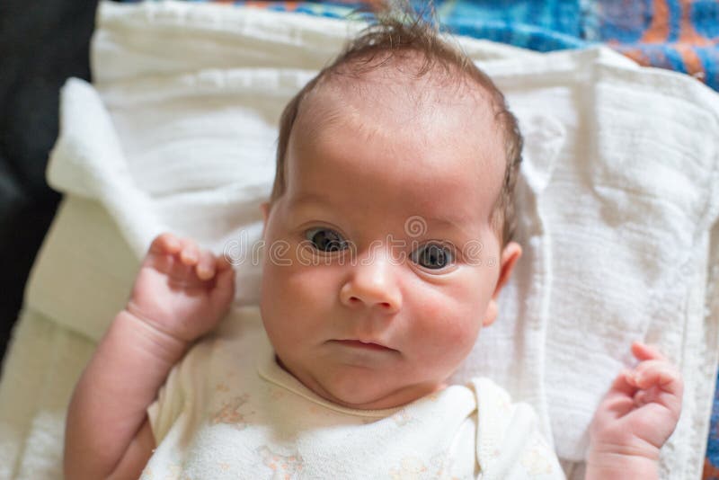 The Newborn One Month Old Baby Lying on the Bed Stock Image - Image of ...