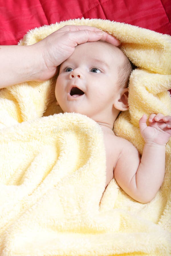 Newborn in Soft Yellow Blanket Stock Image - Image of lying, childhood ...