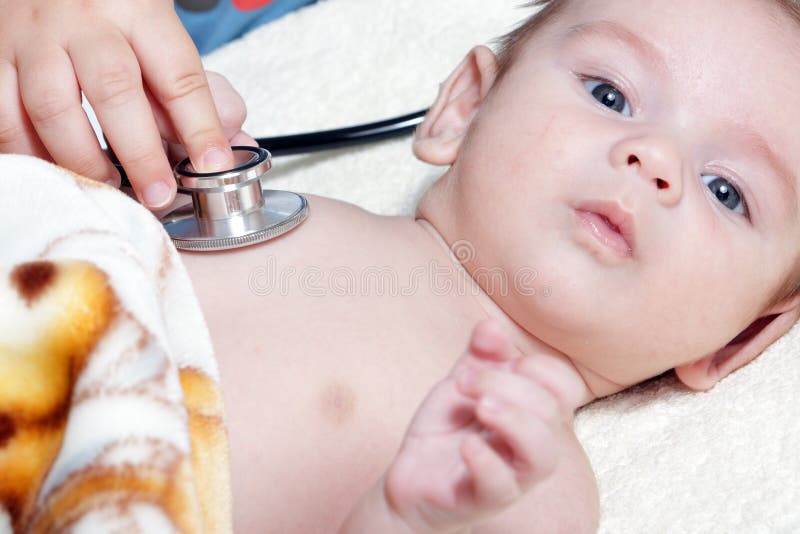 Newborn with stethoscope stock image. Image of illness - 24856007