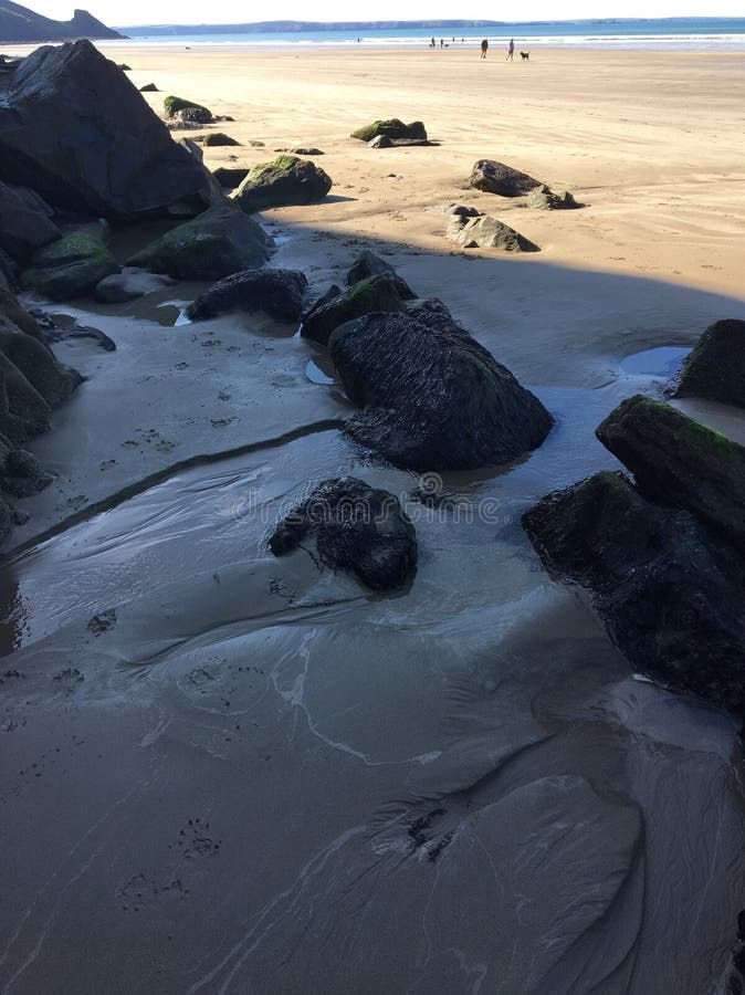 Tide going out stock image. Image of beach, pembrokeshire - 125167081
