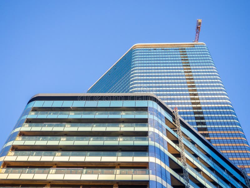 A Newly Built House. Glazed Skyscraper. Reflection of the Sky in the ...