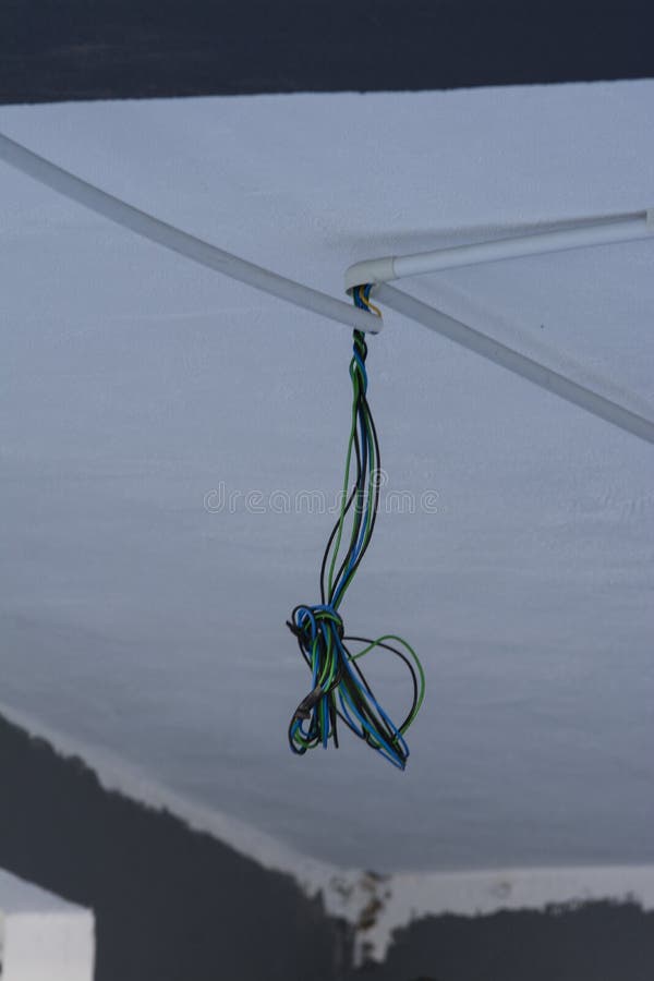 Newly Hanging Electric Wire on Ceiling Wall. Stock Image - Image of ...
