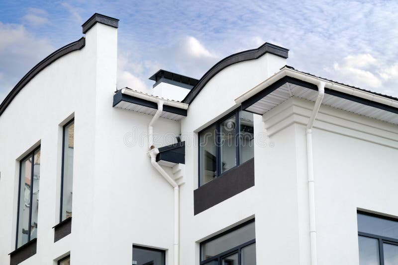 Newly Installed Construction Frame House Rain Gutter System on the Roof ...