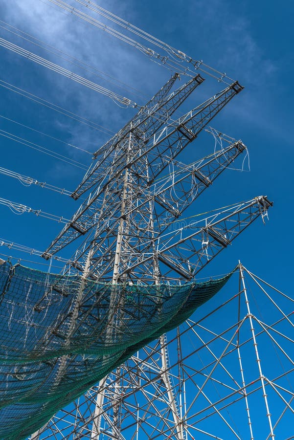 A Newly Installed High-voltage Pylon with Some Cables Connected Stock ...