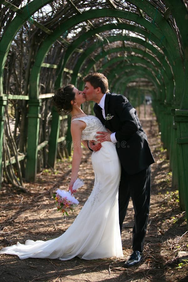 Wedding couple stock photo. Image of grotto, kiss, bride - 28986824