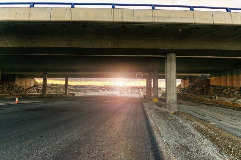 Newly Paved Highway Under the Construction of a Bridge Stock Image ...