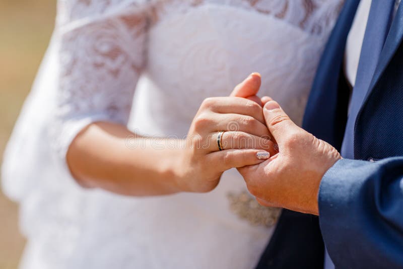 Newly Wed Couple`s Hands with Wedding Rings Stock Photo - Image of ...