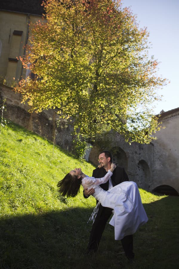 Newlywed couple spinning stock image. Image of citadel - 27691481