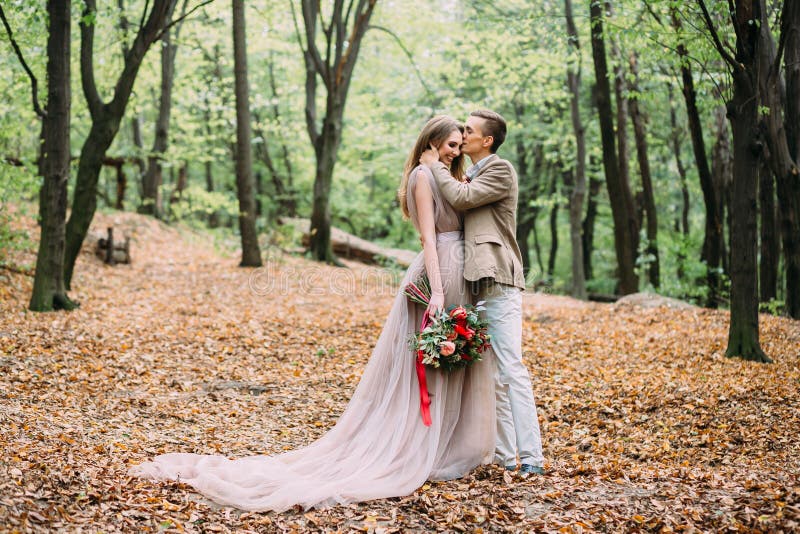 Newlyweds in an Autumn Romantic Forest. Wedding Ceremony Outdoors Stock ...
