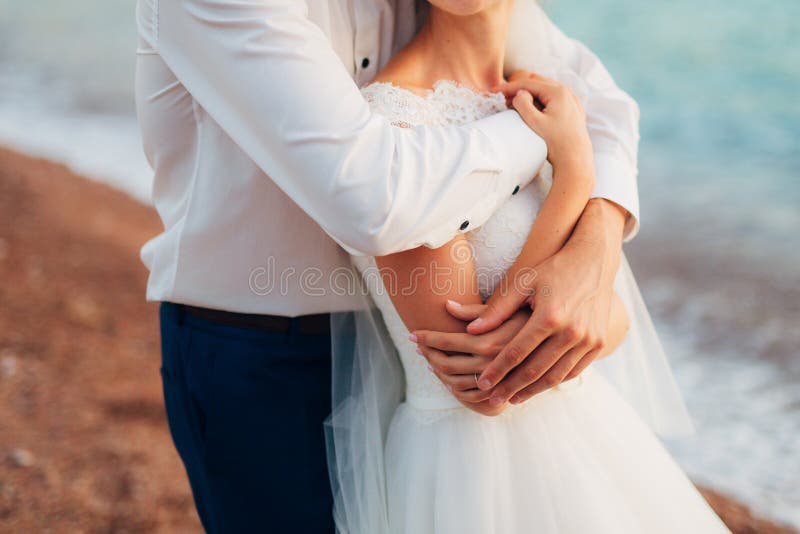 Newlyweds Hug Each Other in Montenegro Stock Photo - Image of embracing ...