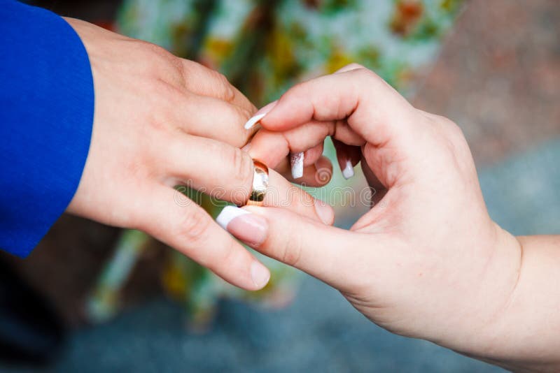 Newlyweds Wear Each Other& X27;s Rings Stock Image - Image of couple ...