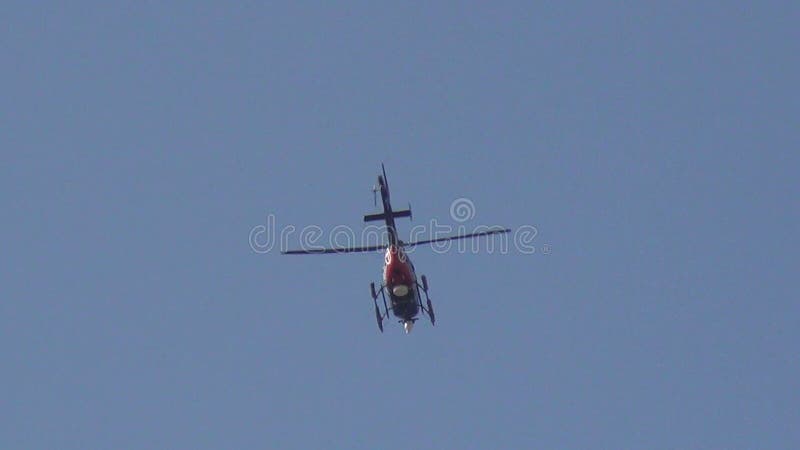 Red Helicopter Hovering Over a Boat in Bay Area California Stock Video ...