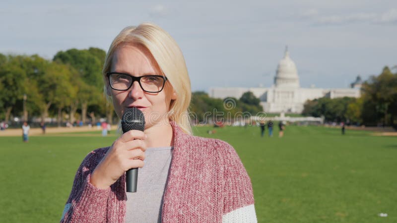 Caucasian News Reporter Talking in Front of US Capitol Building Stock ...