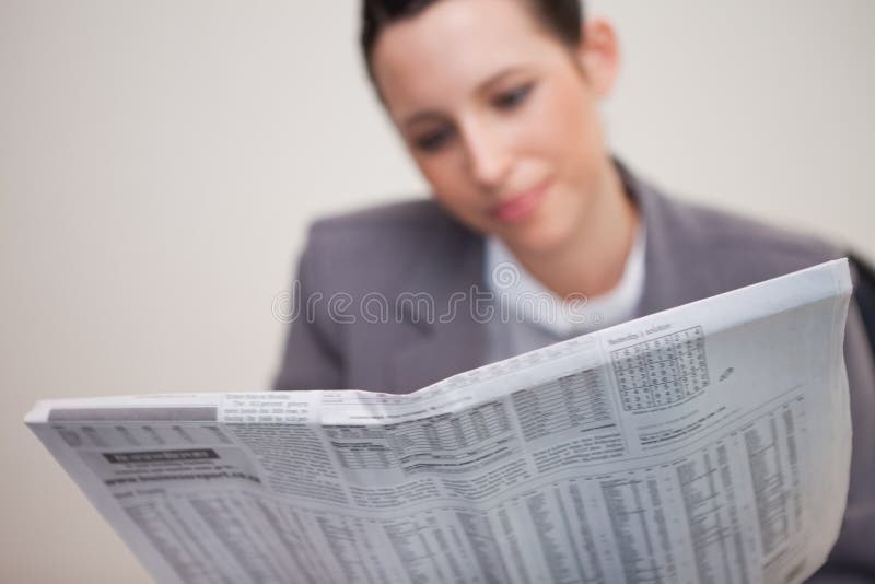 Newspaper Being Read by Businesswoman Stock Image - Image of newspaper ...