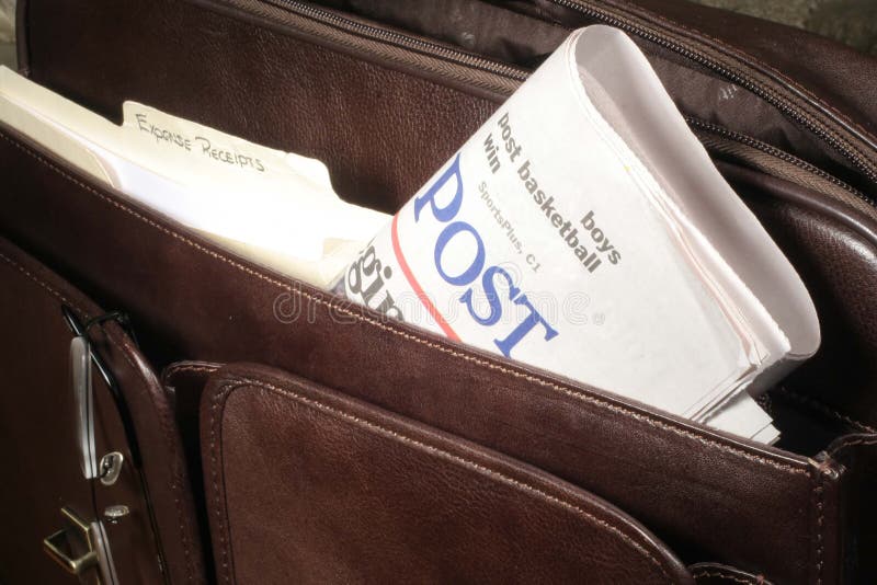 Newspaper in Briefcase stock photo. Image of portfolio - 1729822