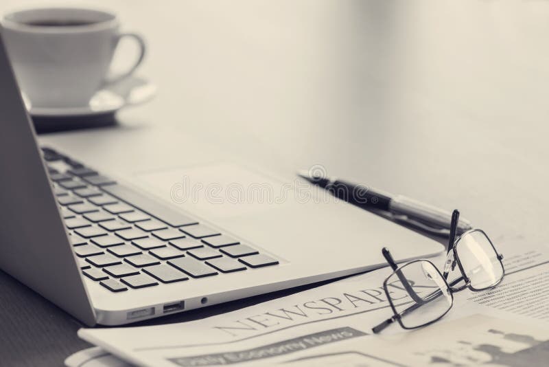Newspaper with Computer on Table Stock Photo - Image of text, computer ...