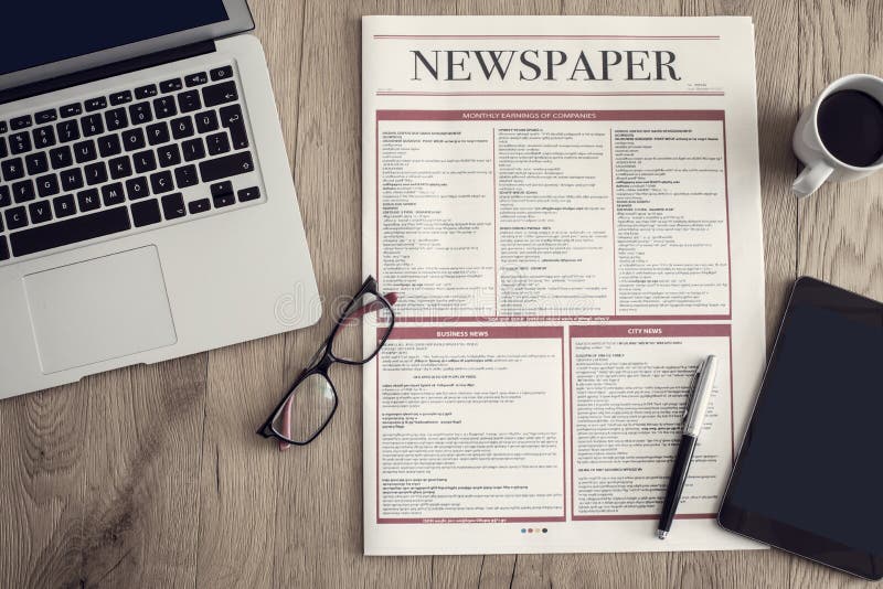 Newspaper with Computer on Wooden Background Stock Photo - Image of ...