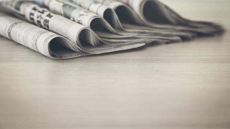 Newspaper concept on desk stock photo. Image of newspaper - 369467610