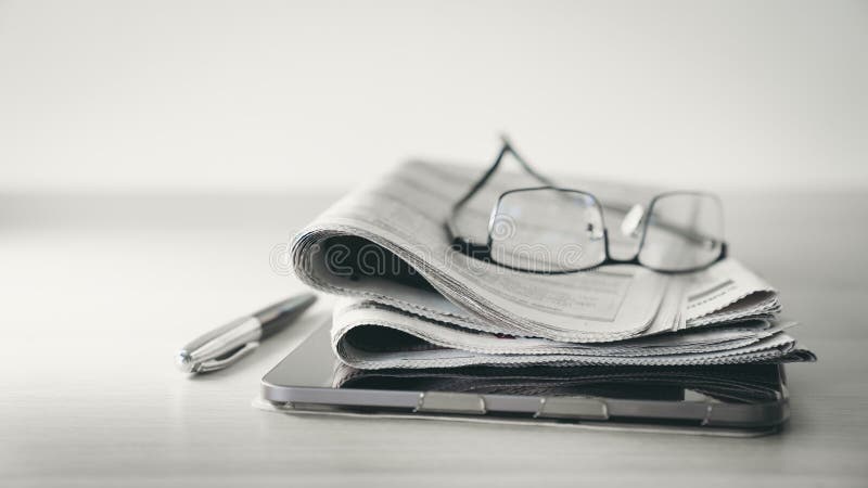 Newspaper concept on desk stock photo. Image of eyeglasses - 369467642