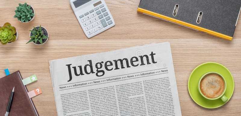 A Newspaper on a Desk with the Headline Judgement Stock Photo - Image ...
