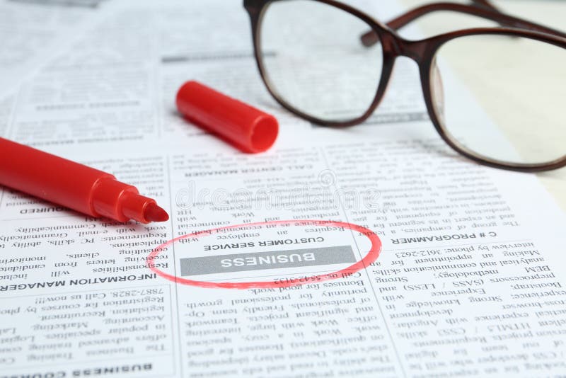 Newspaper with Marked Advertisement and Glasses. Search Concept Stock ...