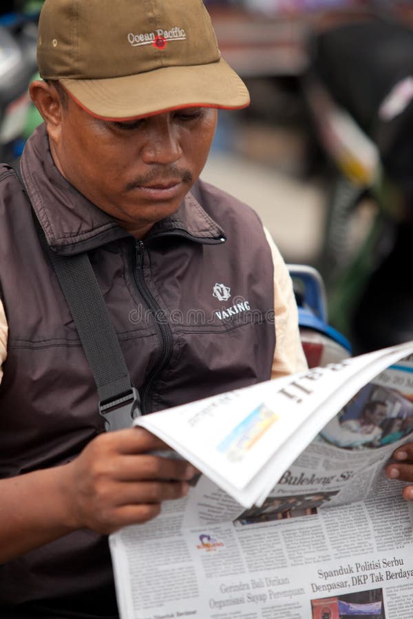 Newspaper reader editorial stock image. Image of senior - 23608579