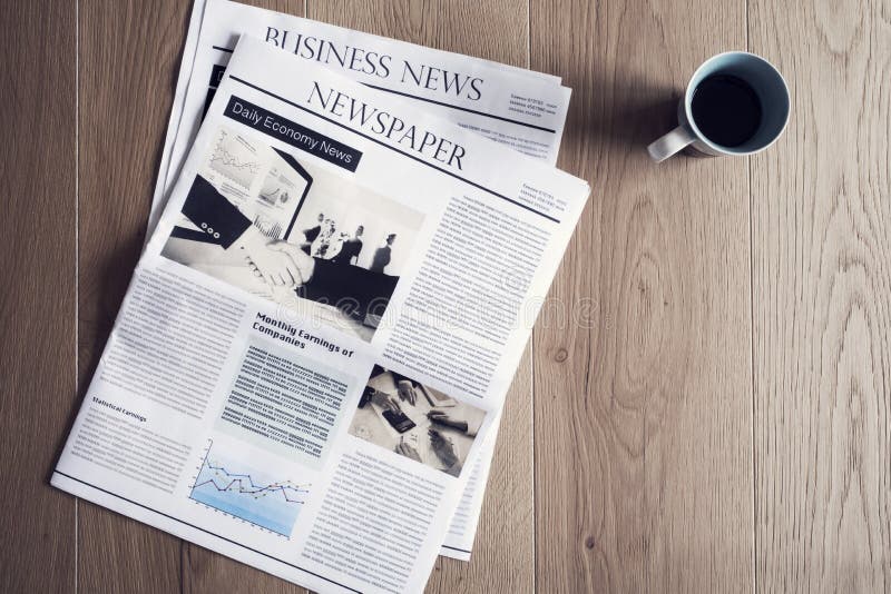 Reading newspaper on table stock photo. Image of reading - 102885516