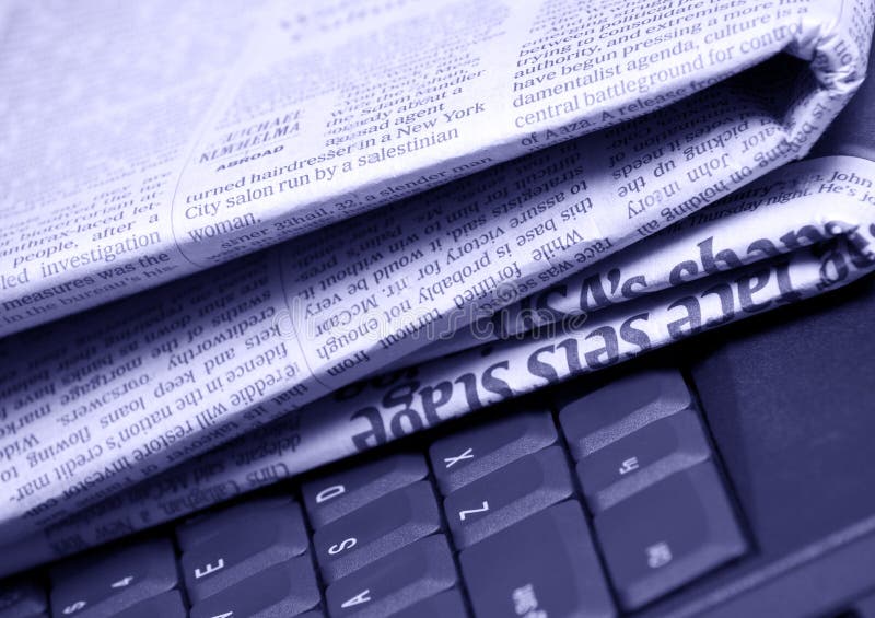 Newspapers with Computer stock photo. Image of writing - 6327912