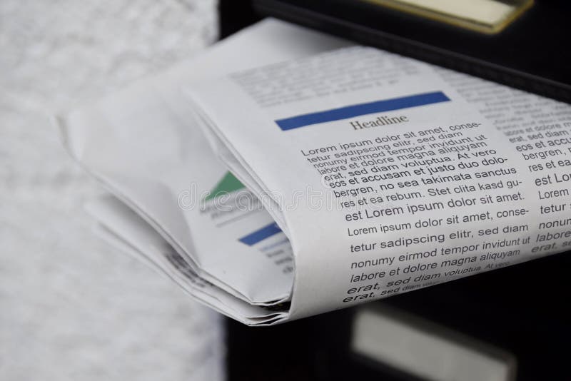 Newspapers in a mailbox stock photo. Image of newspaper - 137360266